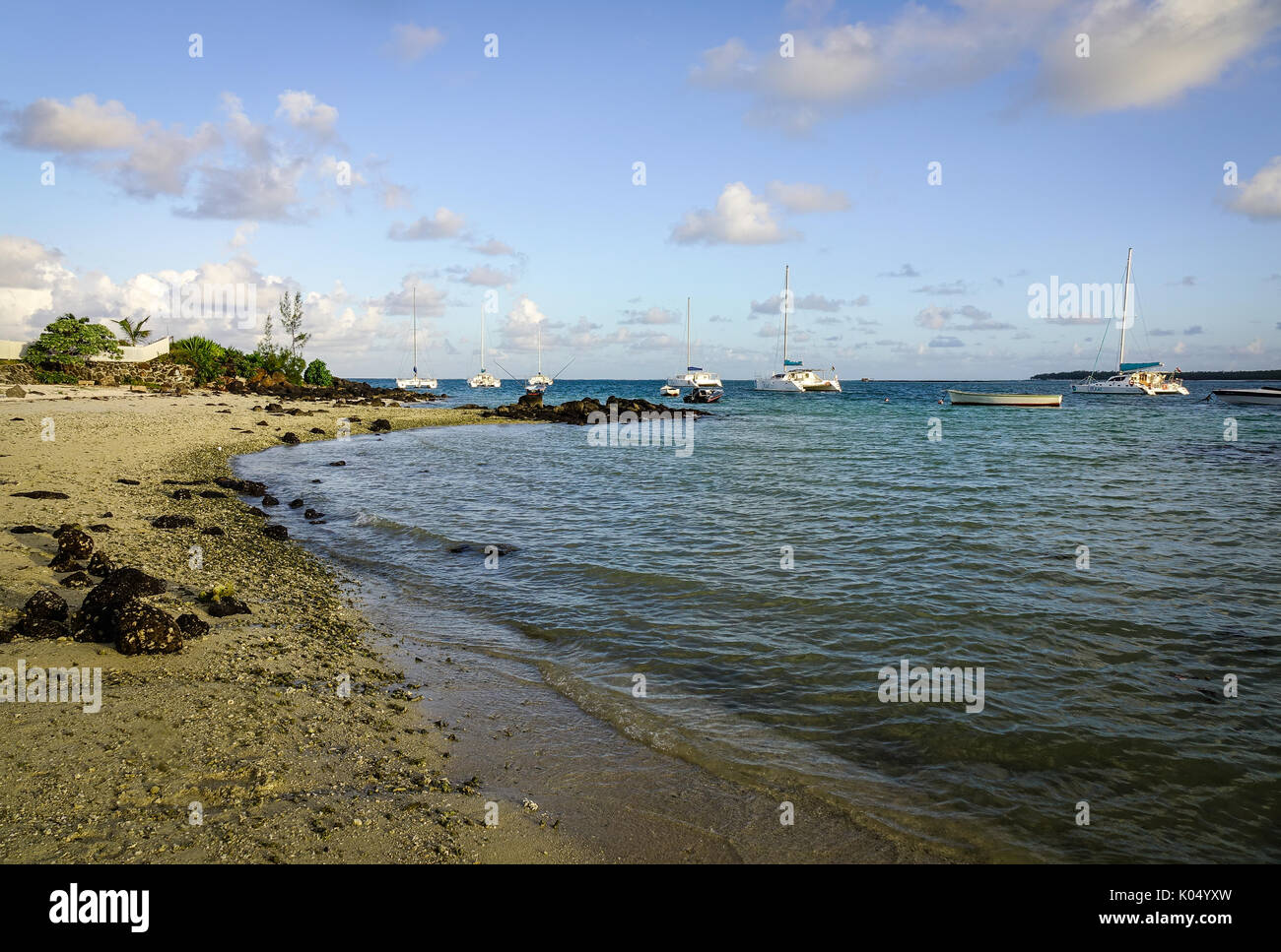 Seascape of Grand Baie at sunset in Mauritius. Mauritius enjoys a ...
