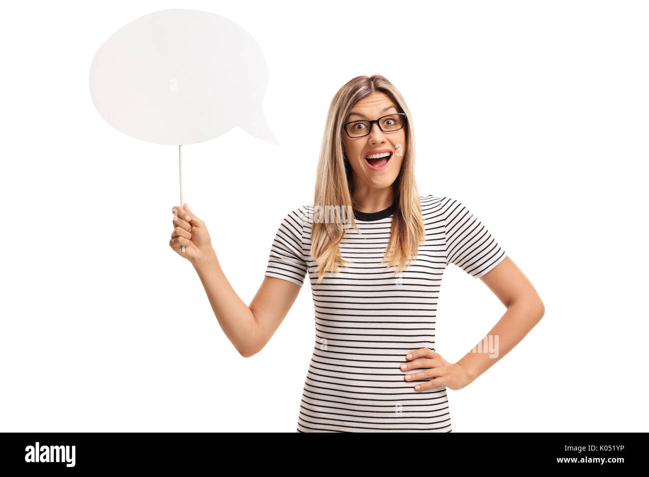 Cheerful young woman with a chat bubble isolated on white background ...
