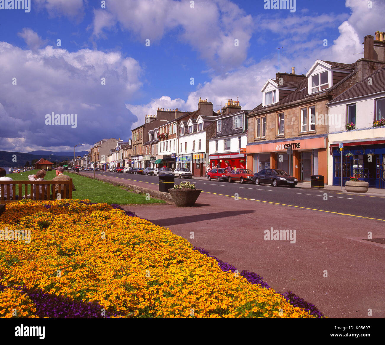 The seafront and promenade in the busy town of Helensburgh, The Clyde ...