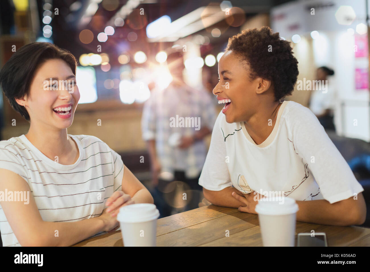 Women laughing and drinking hi-res stock photography and images - Alamy