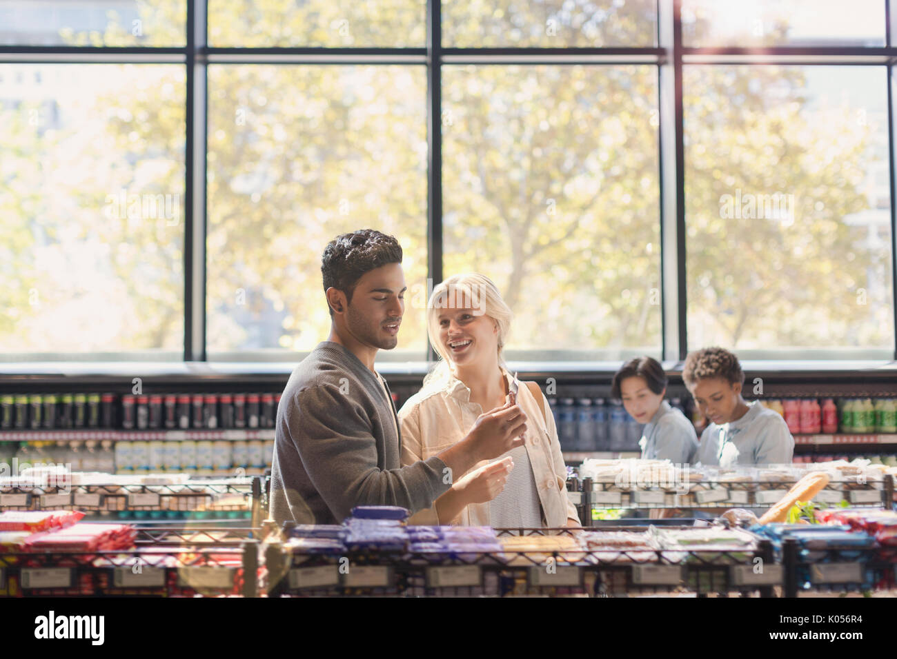 Supermarket customer asian cell phone hi-res stock photography and ...