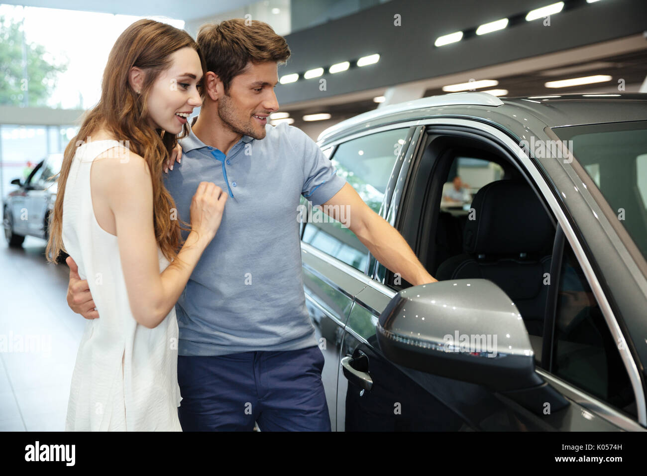 Couple excited choosing hi-res stock photography and images - Alamy