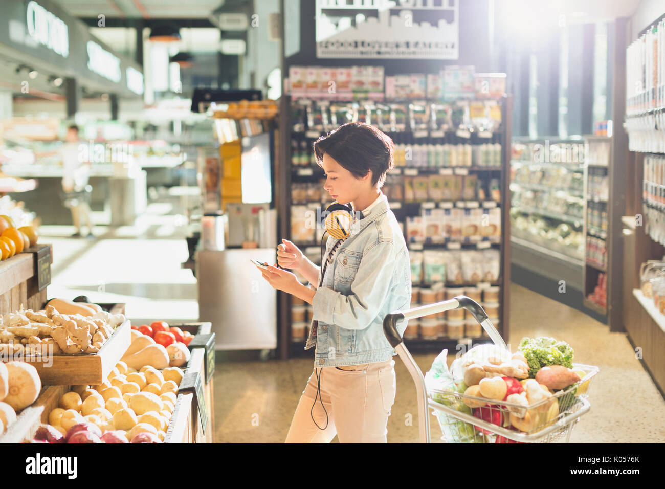 Supermarket customer asian cell phone hi-res stock photography and ...