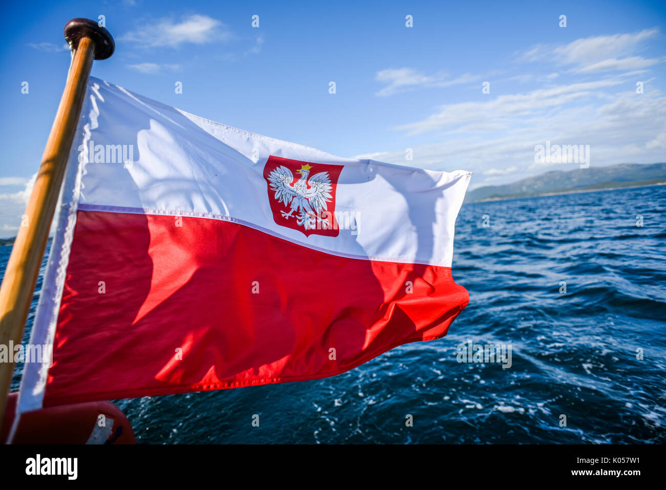 Polish flag waving while sailing on a yacht in the north sea Stock ...