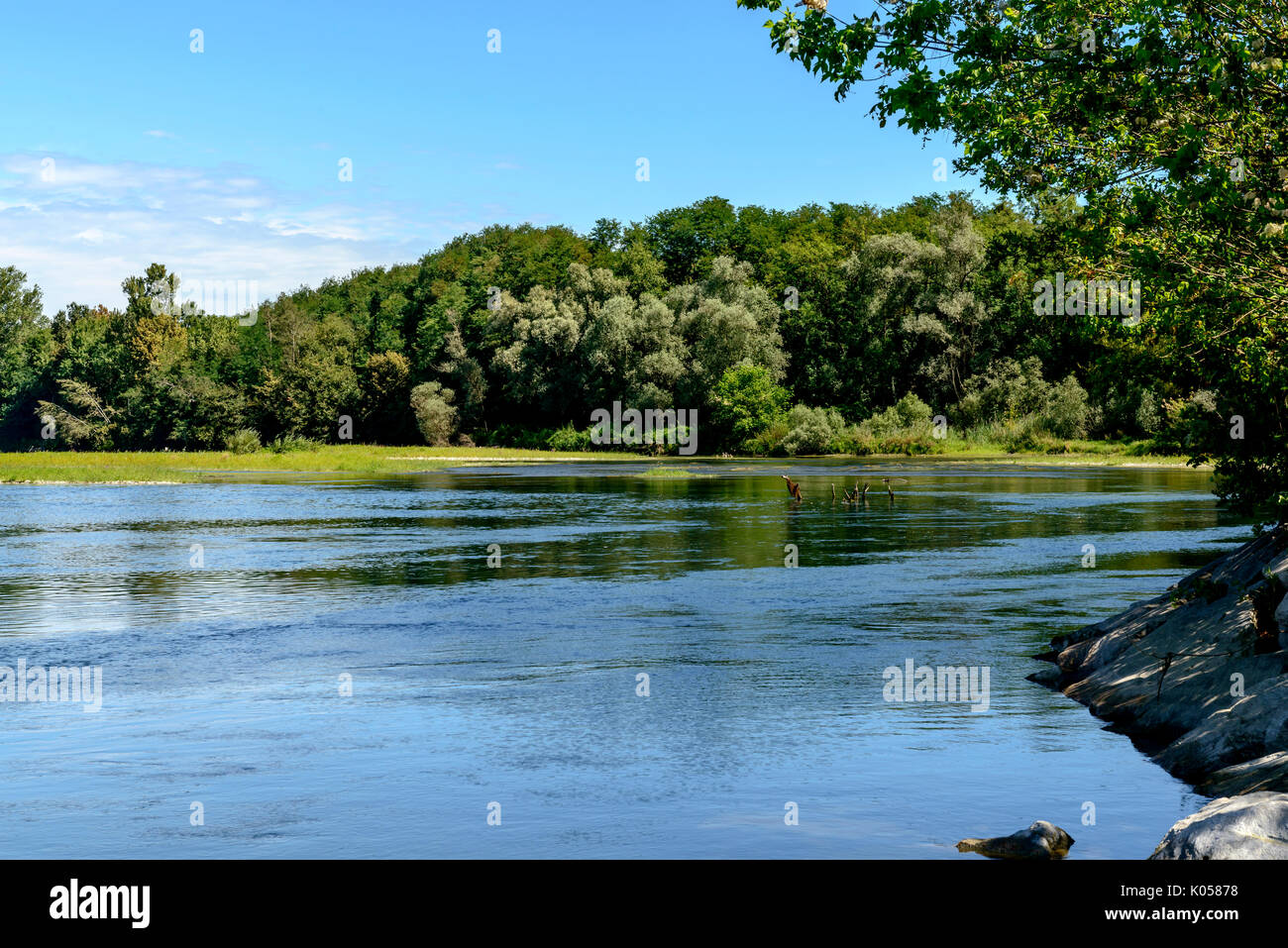 landscape with blue waters of Ticino river, shot in a bright summer day ...