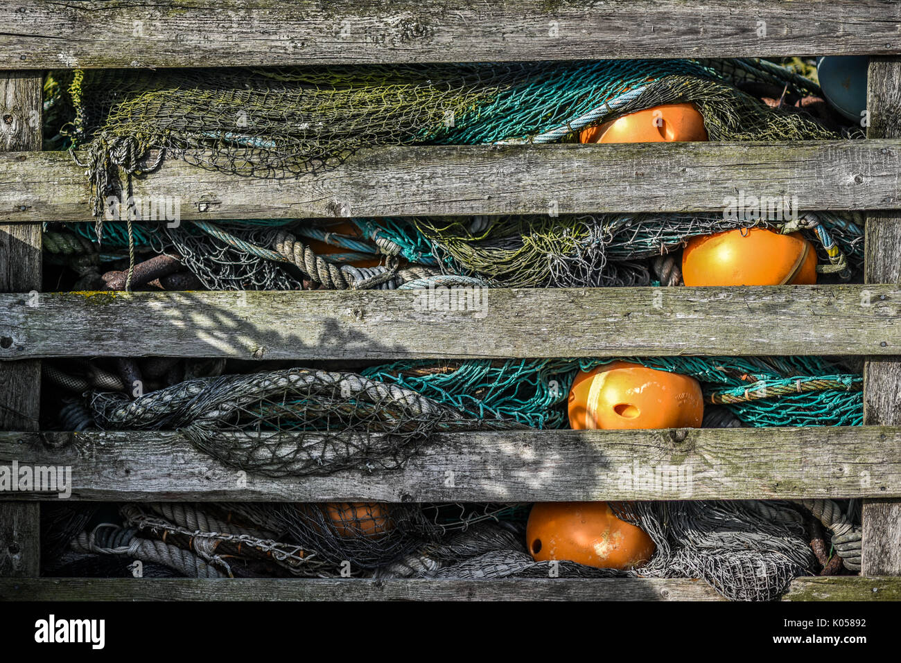 Fishing nets in a wooden box on the Danish coast Stock Photo - Alamy