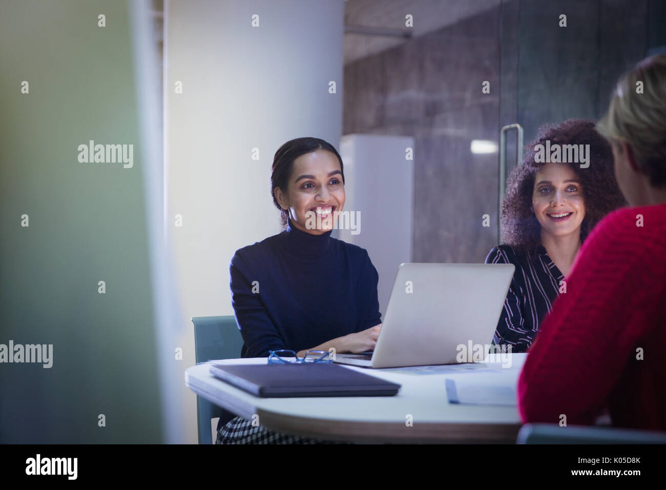 Smiling while working hi-res stock photography and images - Alamy