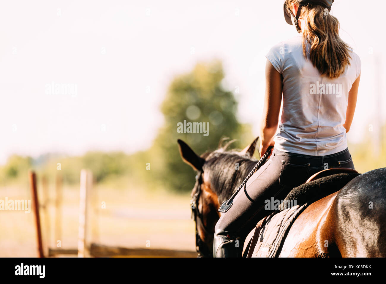 Picture of young pretty girl riding horse Stock Photo - Alamy