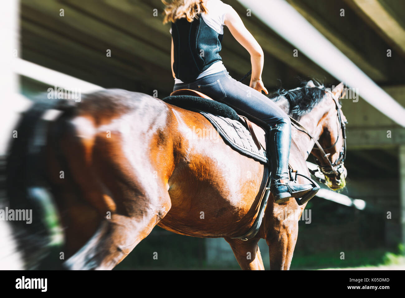 Picture of young pretty girl riding horse Stock Photo - Alamy