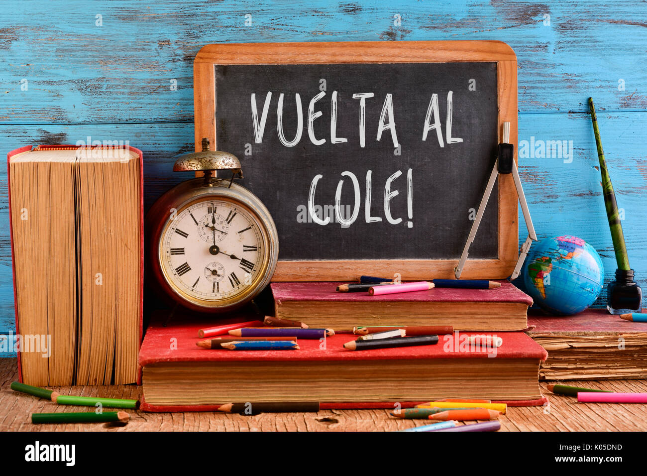 wooden-framed chalkboard with the text vuelta al cole, back to school ...