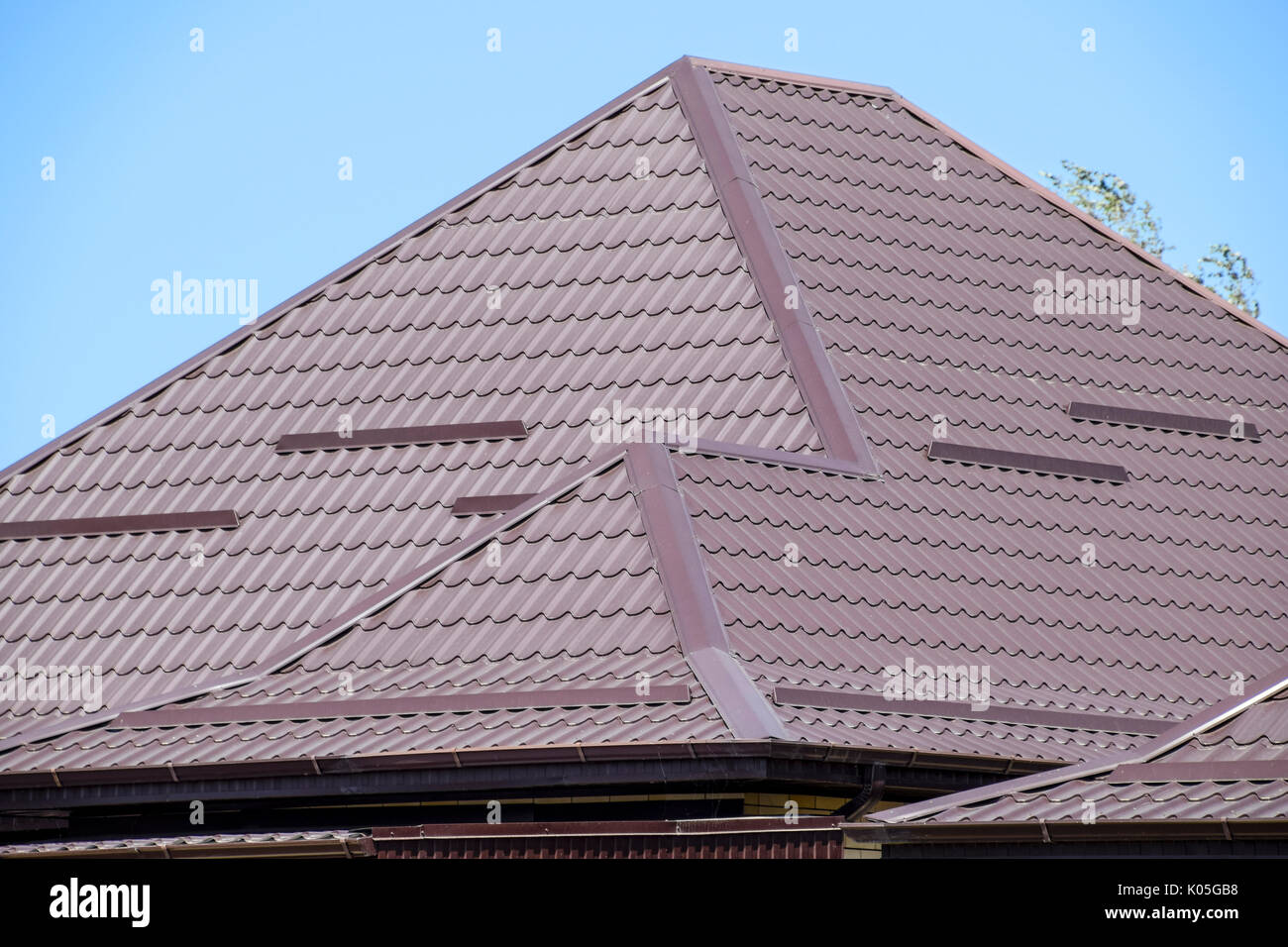Roof metal sheets. Modern types of roofing materials Stock Photo - Alamy