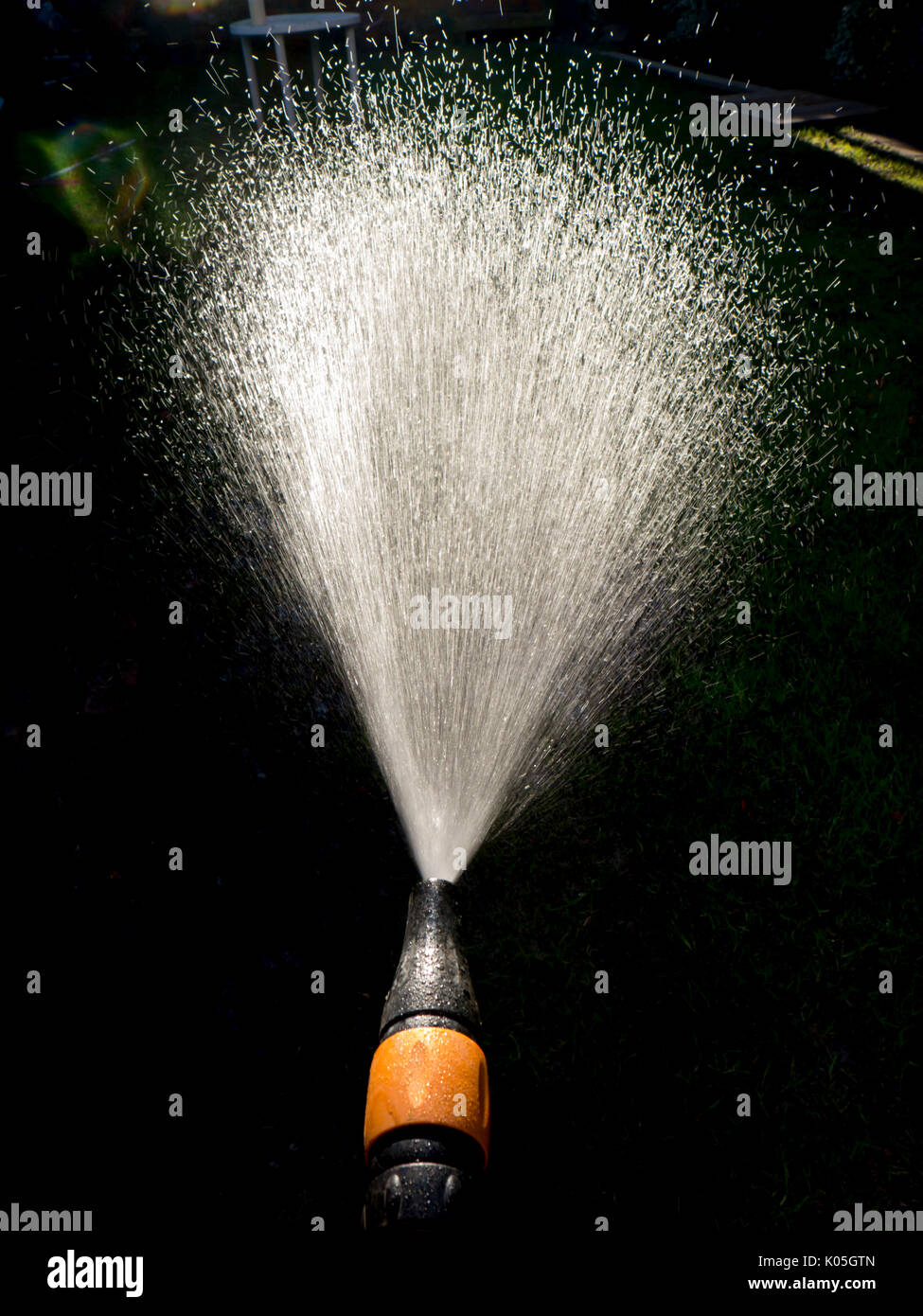 Hose spray hi-res stock photography and images - Alamy
