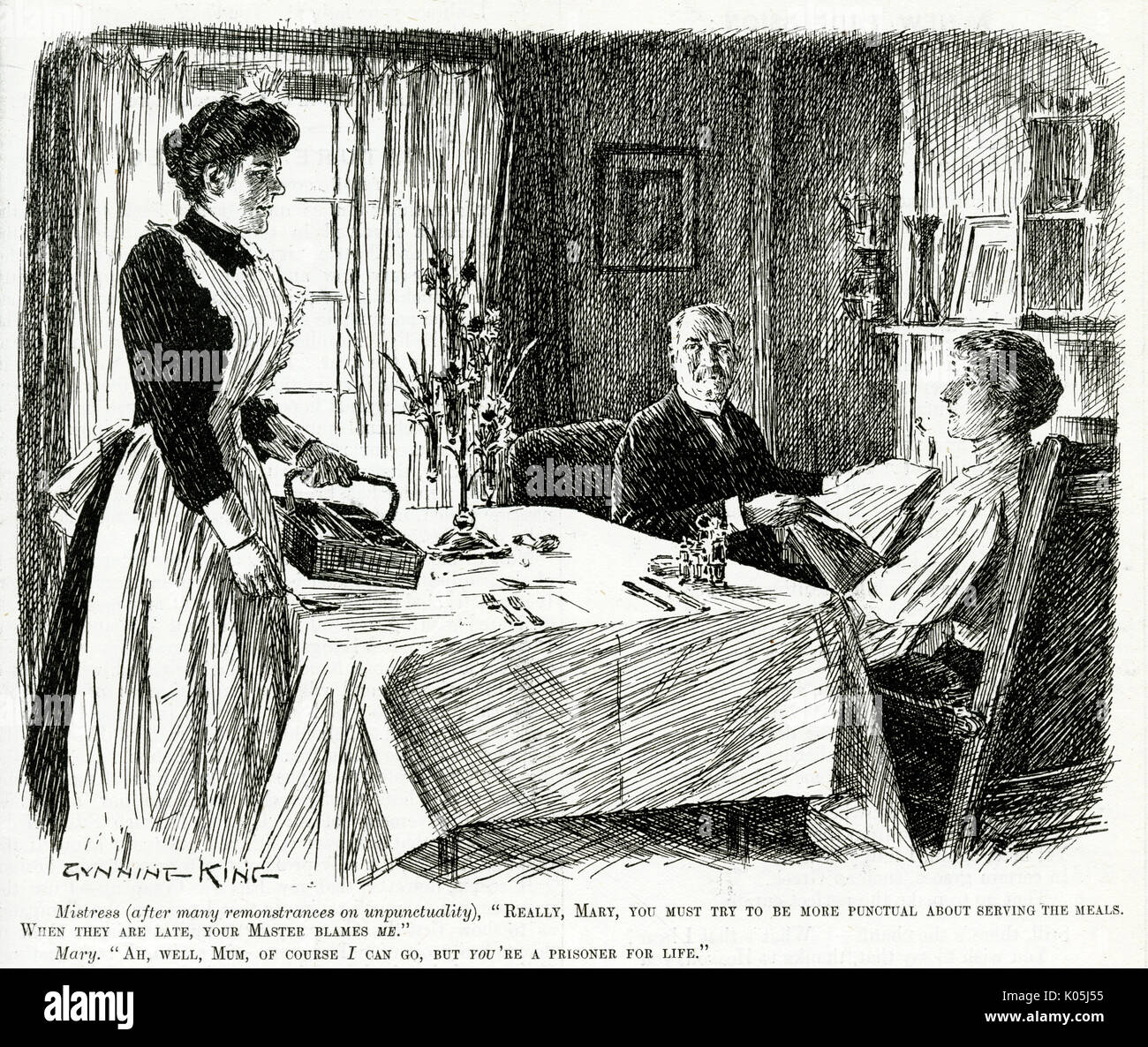 Maid laying table Stock Photo - Alamy