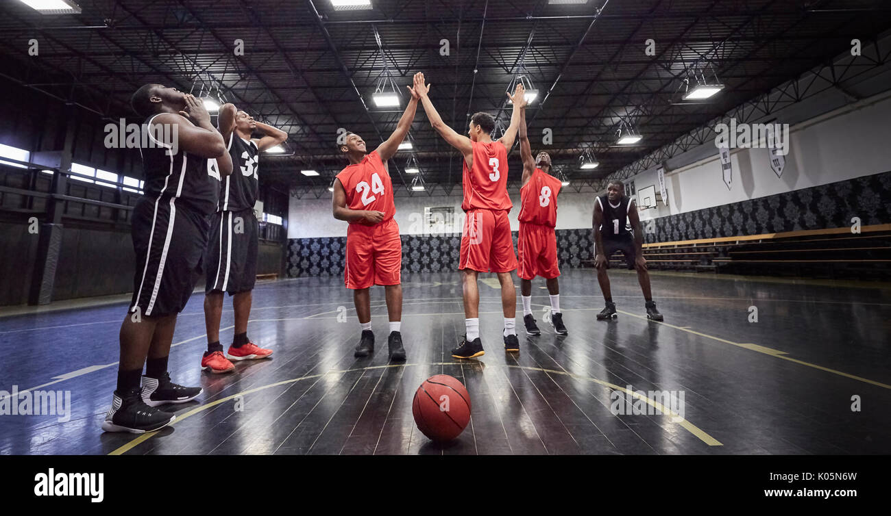 Male basketball players team talking hi-res stock photography and ...