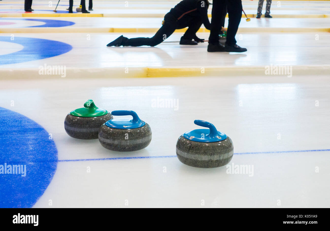 Curling sport stones equipment Stock Photo - Alamy