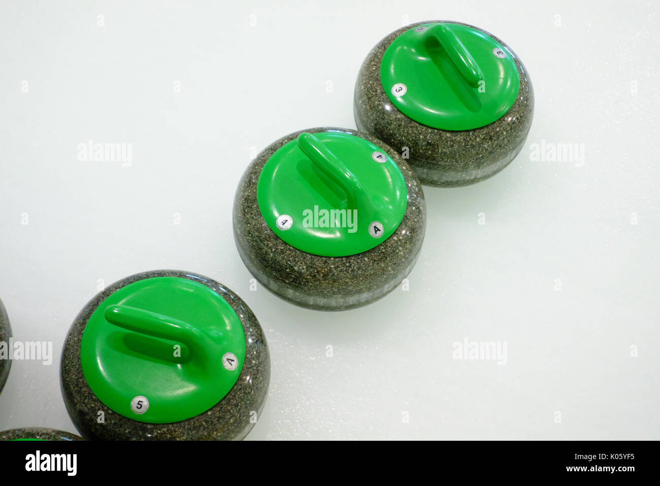 Curling sport stones equipment Stock Photo - Alamy
