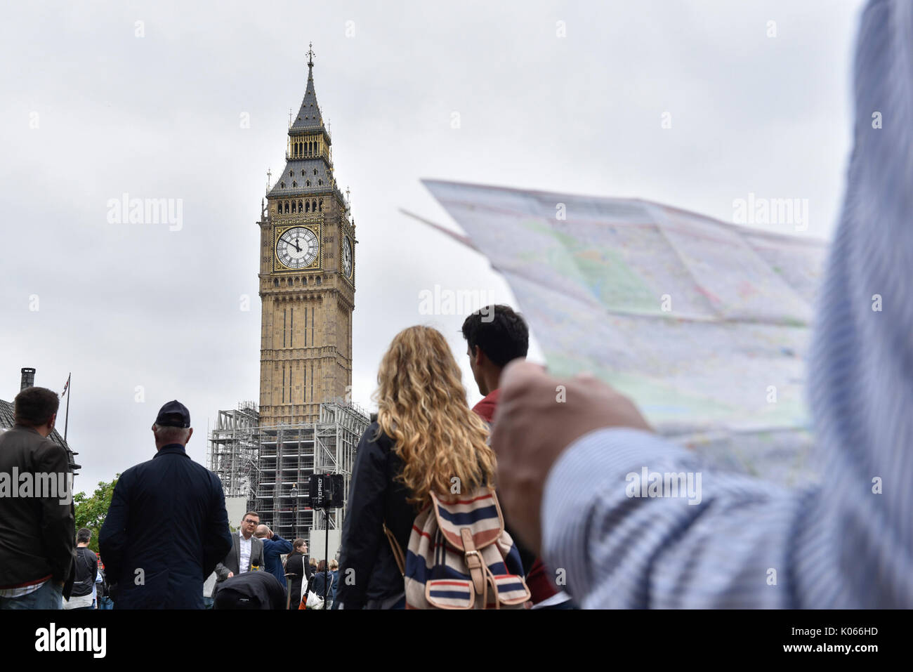 London, UK. 21st Aug, 2017. People gather in front of the Big Ben in ...