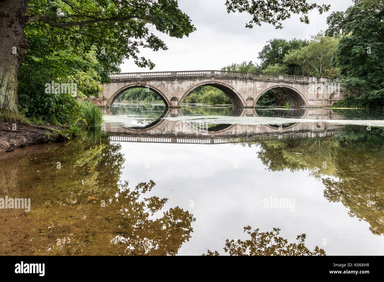 Clumber Park bridge with beautiful reflections on the lake. Clumber ...