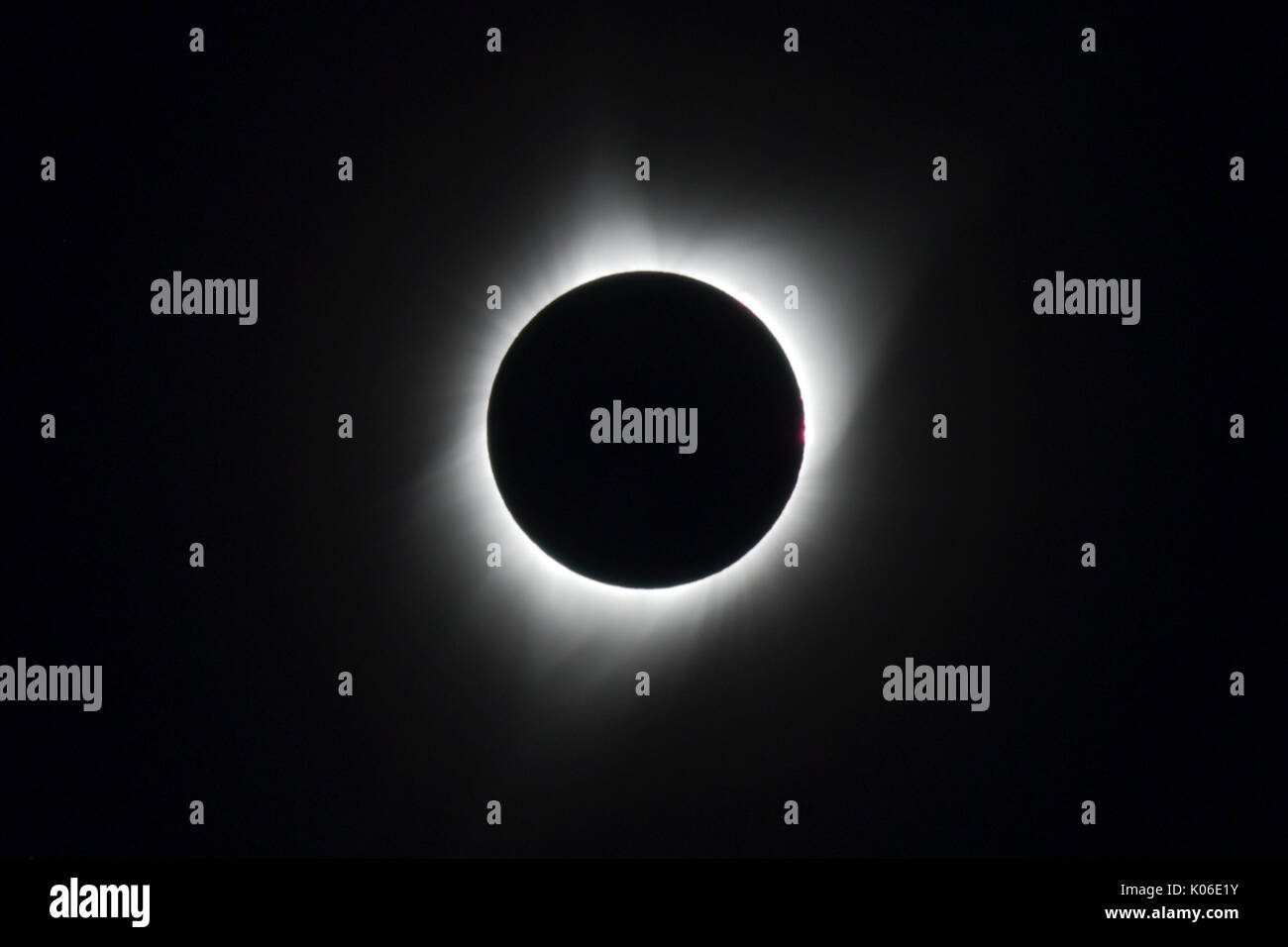 The moon covers the sun during a total solar eclipse over J. Percy ...