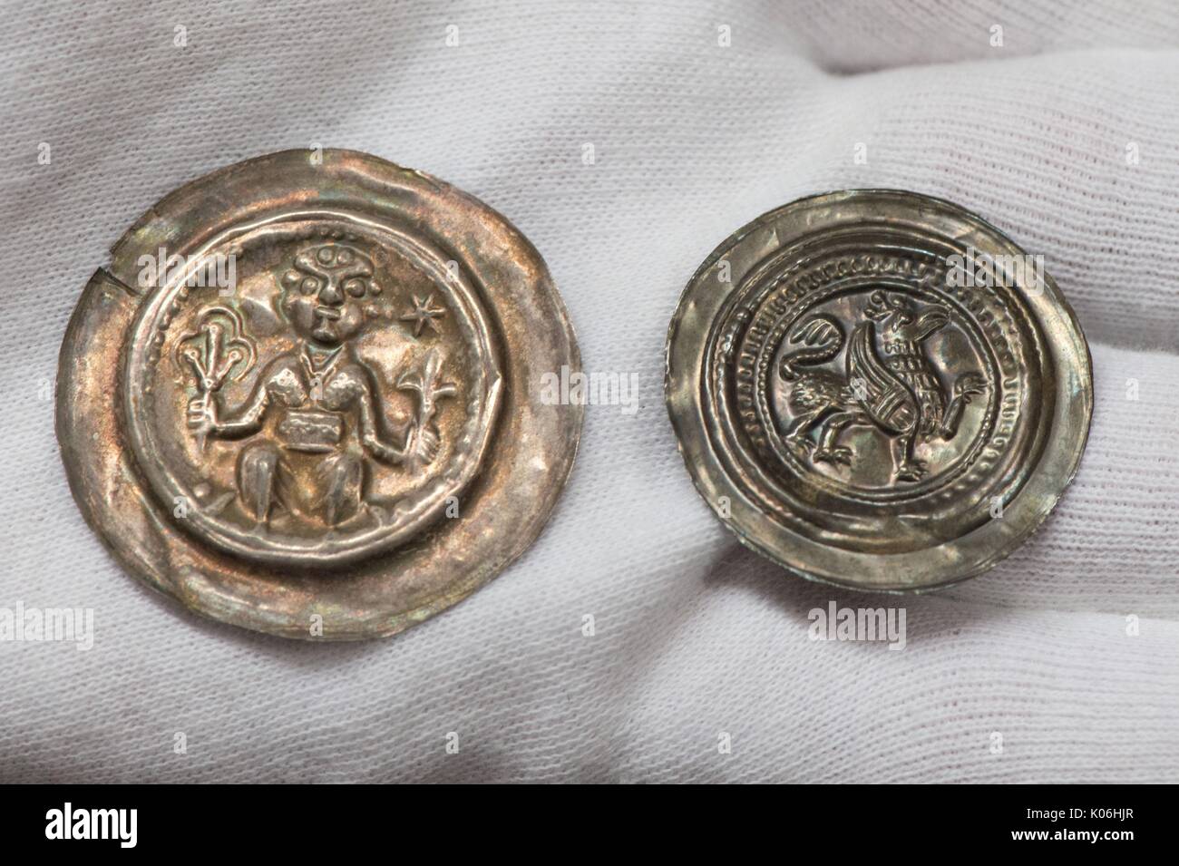 Dresden, Germany. 22nd Aug, 2017. Two one-sided, stamped silver Pfennig ...