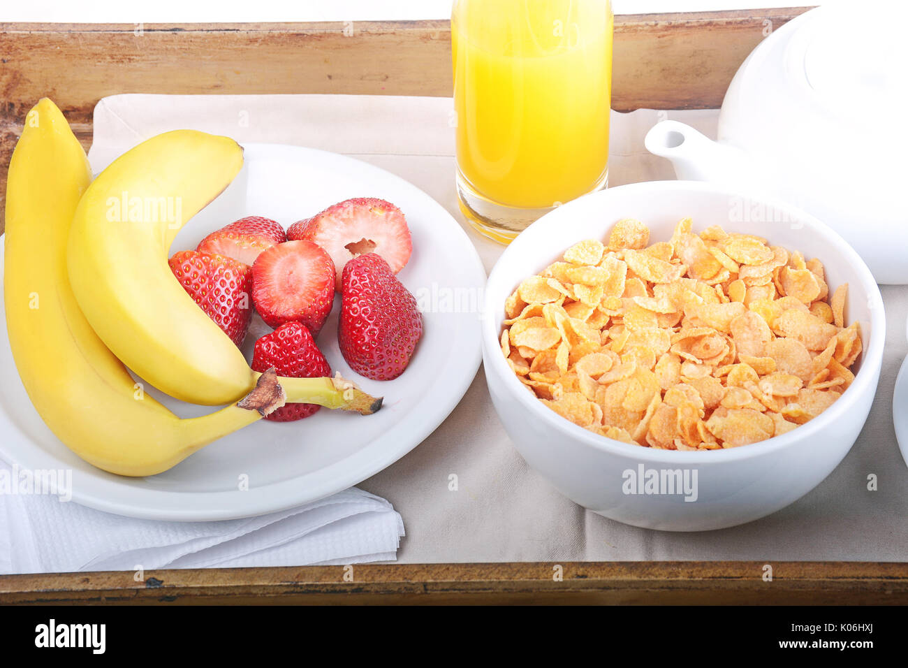 Close up of breakfast tray with orange juice, cereals and fruits Stock ...