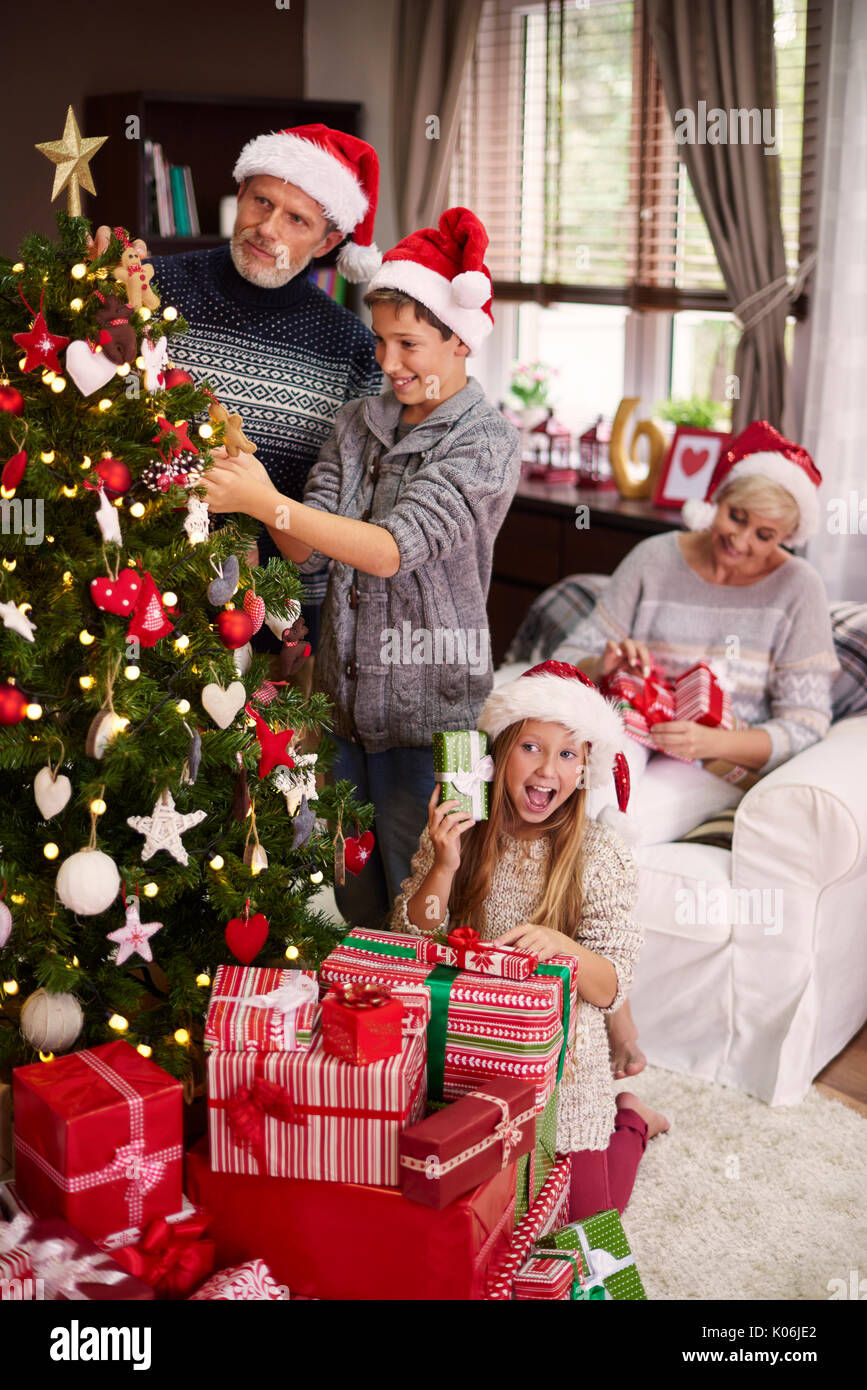 Family busy at their home interior Stock Photo - Alamy