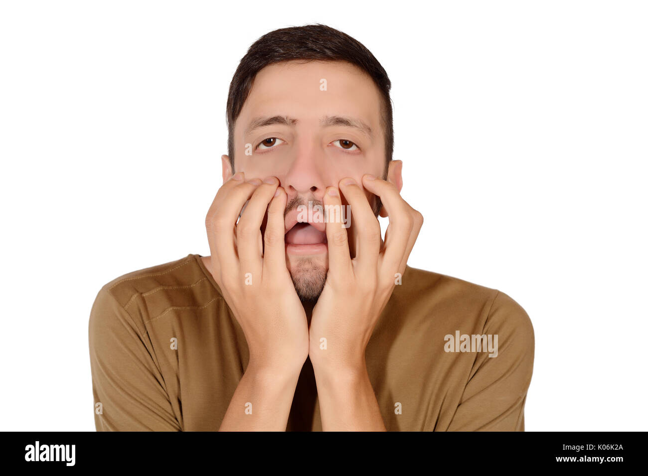 Portrait of an exhausted man. Isolated white background Stock Photo - Alamy