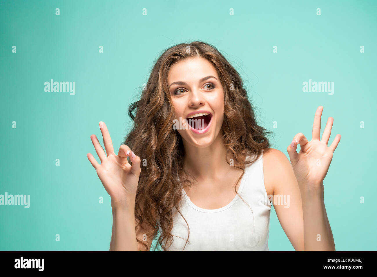The young woman's portrait with happy emotions Stock Photo - Alamy
