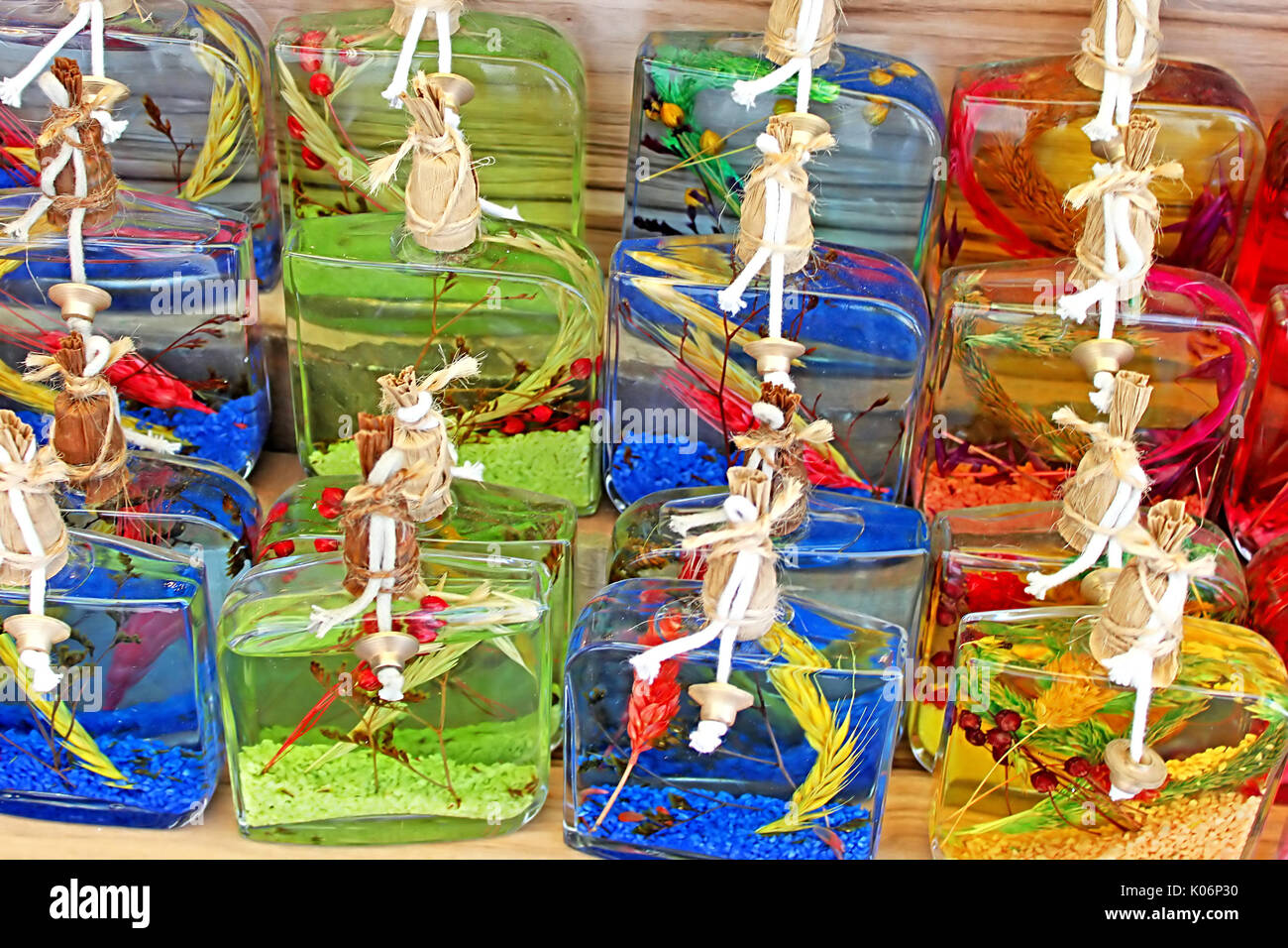 Little glass bottles with colored liquid at a souvenir shop Stock Photo ...