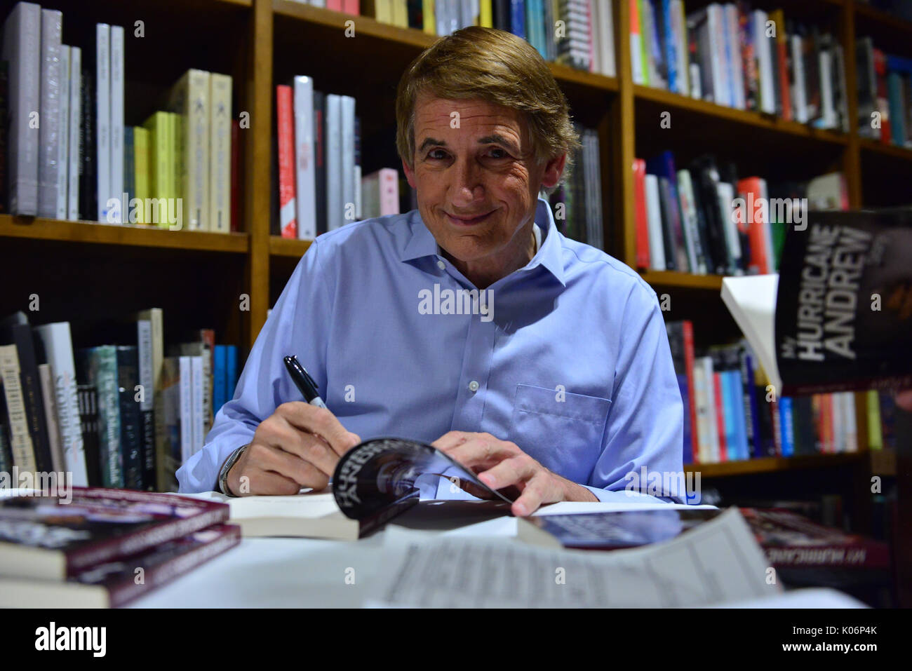 Television meteorologist Bryan Norcross discusses and signs copies of ...