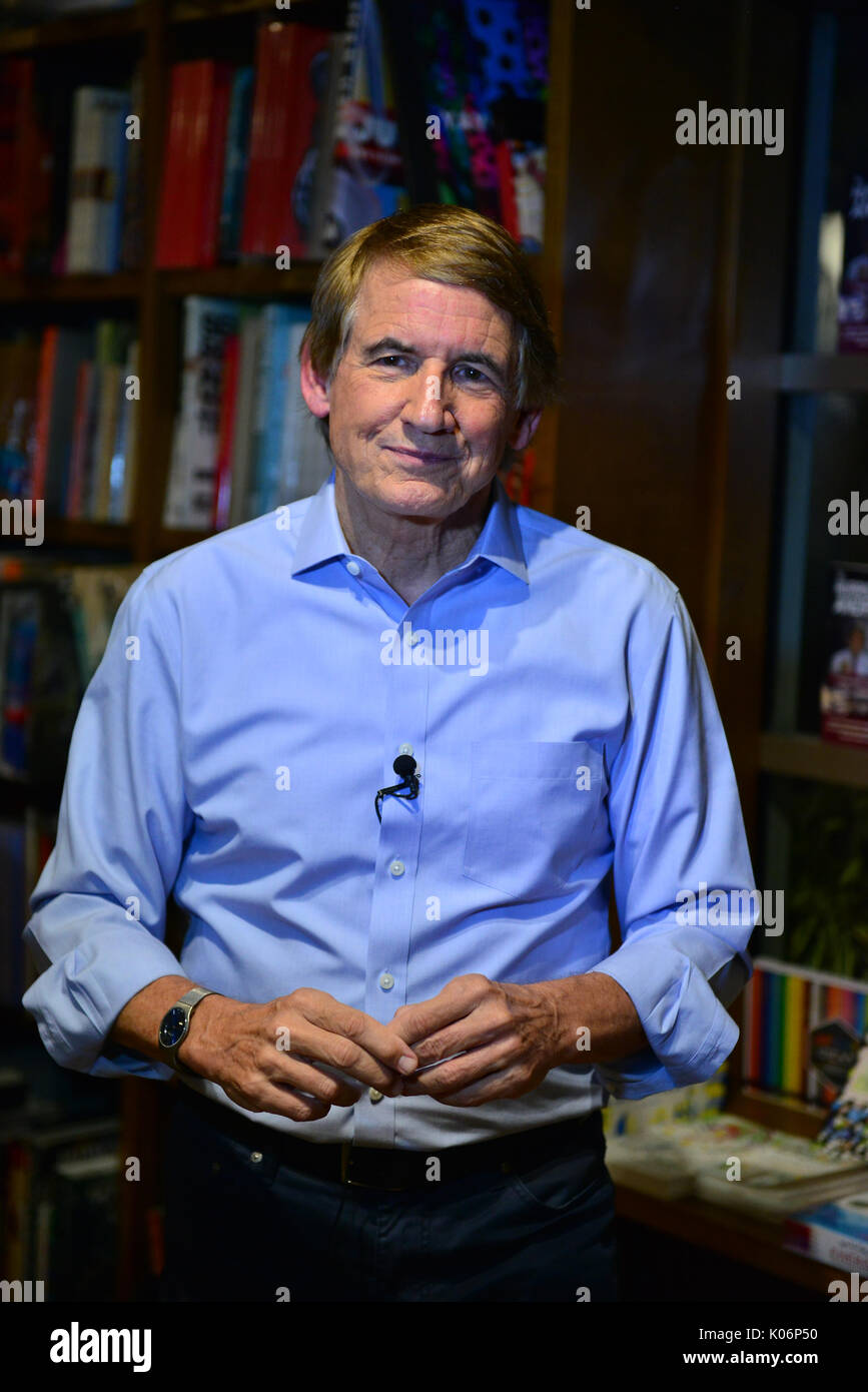 Television meteorologist Bryan Norcross discusses and signs copies of ...