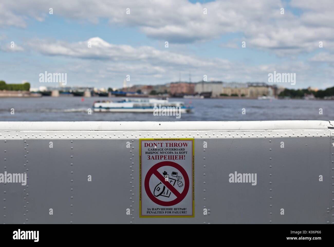 Blurred view on river neva, sign do not throw litter over board, russia ...