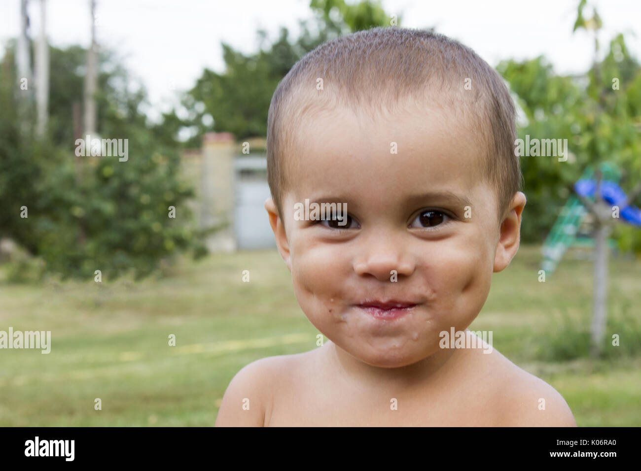 happy baby boy is happy after eating Stock Photo - Alamy