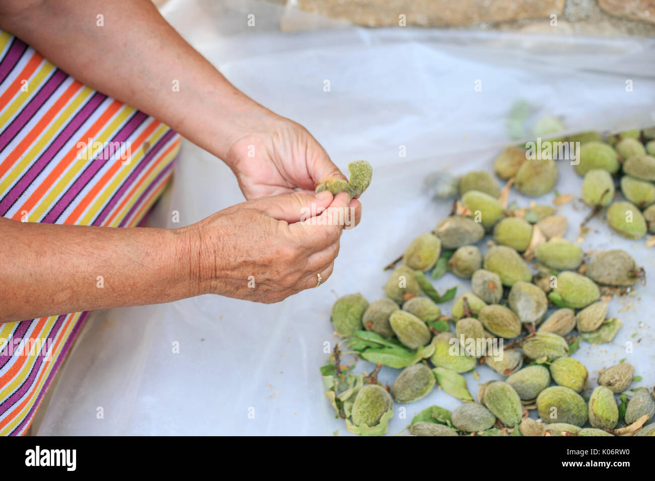 Group of almonds with its skin Stock Photo - Alamy