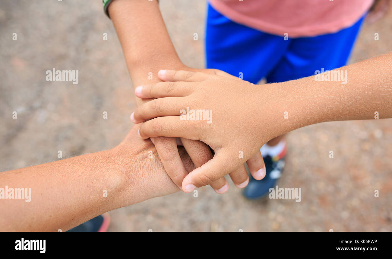 Three hand together Stock Photo - Alamy