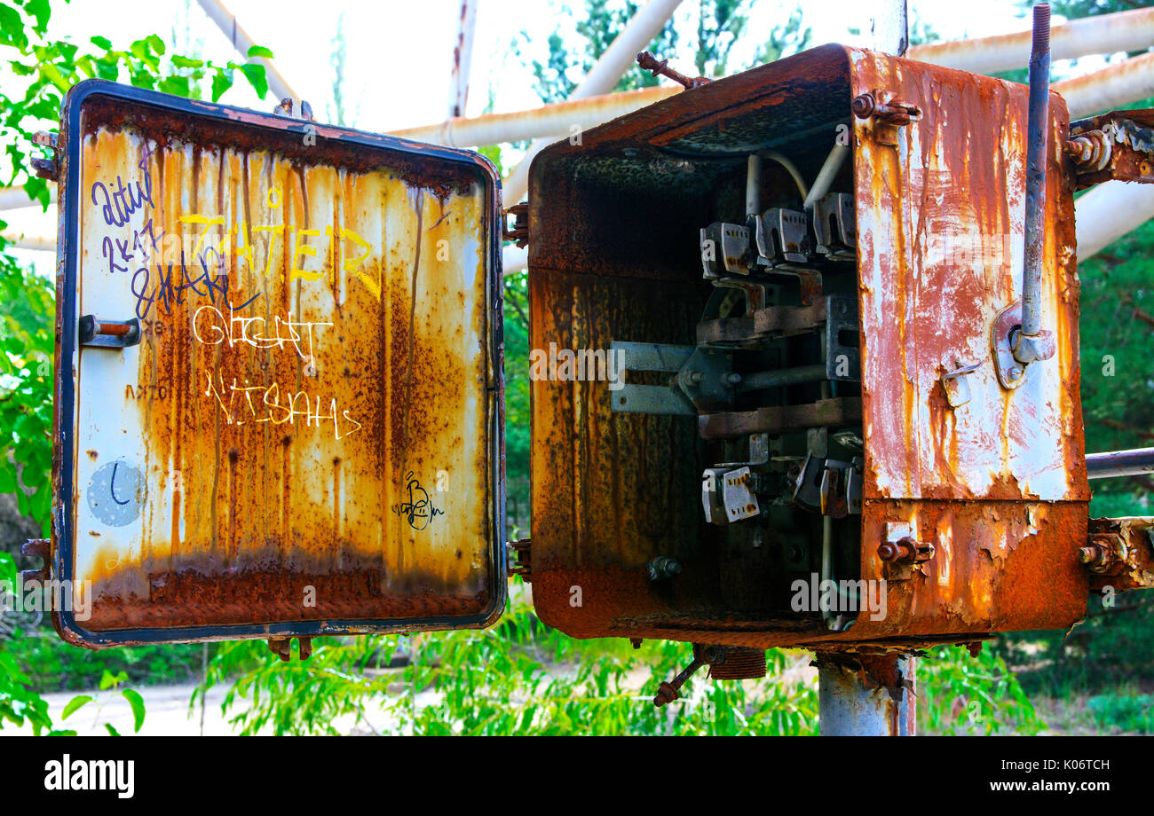 Old rusty junction boxes. Dead military unit. Consequences of the ...