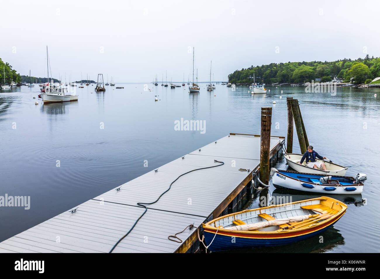 Man rowing boat rain hi-res stock photography and images - Alamy