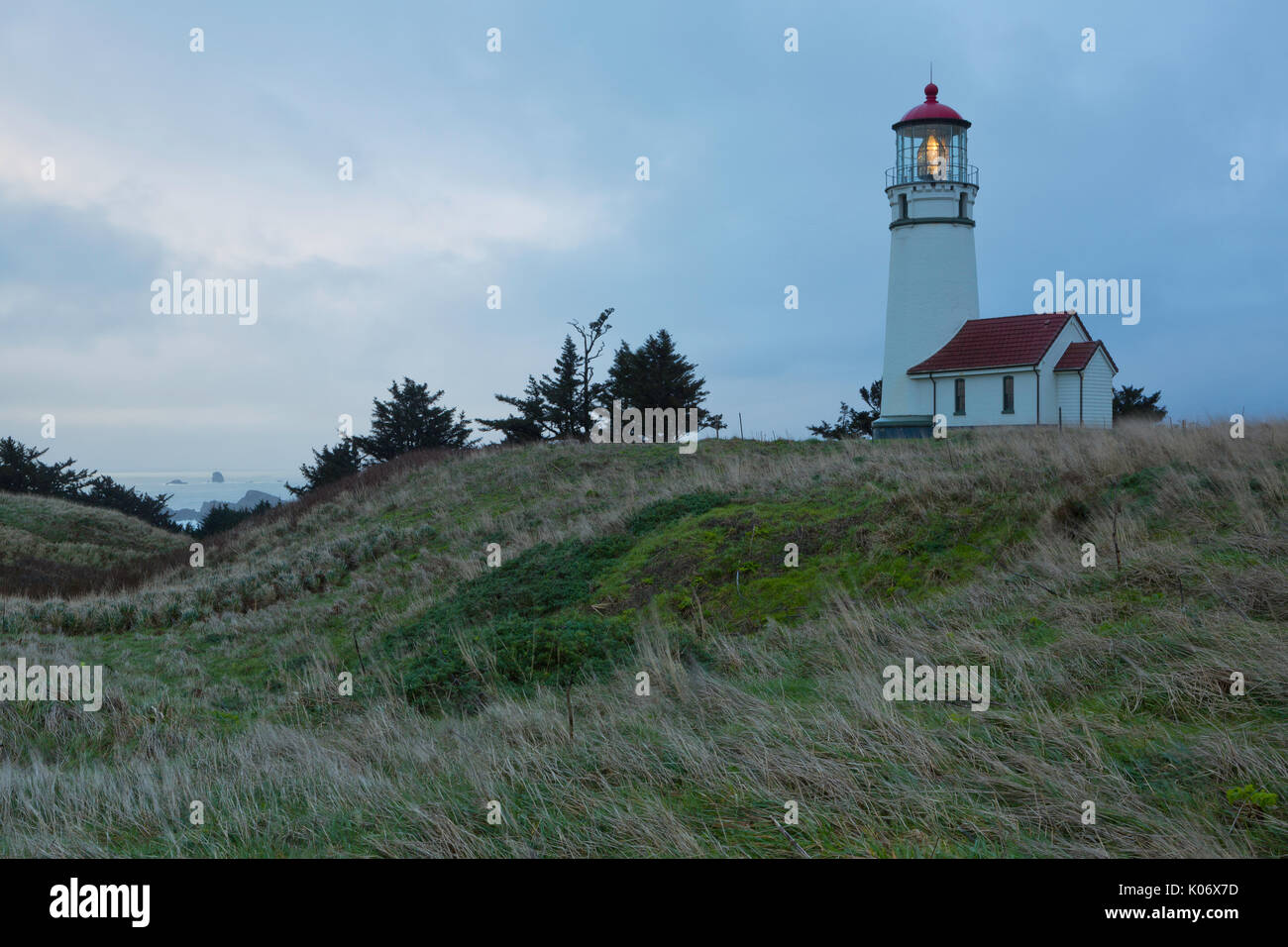 Cape Blanco lighthouse on the Oregon coast in the morning near sunrise ...