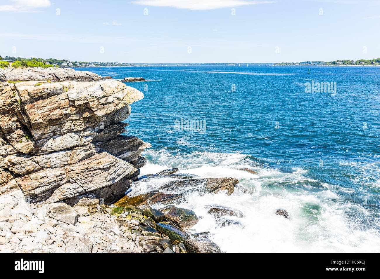 Cliff rocks side view by Portland Head Lighthouse in Fort Williams park ...