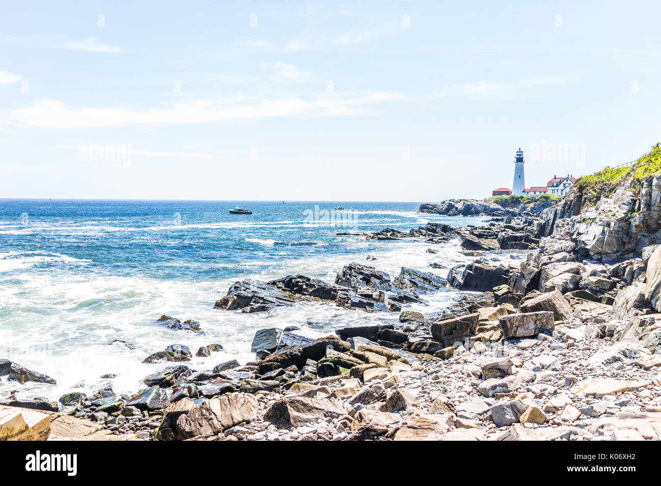 Cliff rocks side view shore with Portland Head Lighthouse in Fort ...