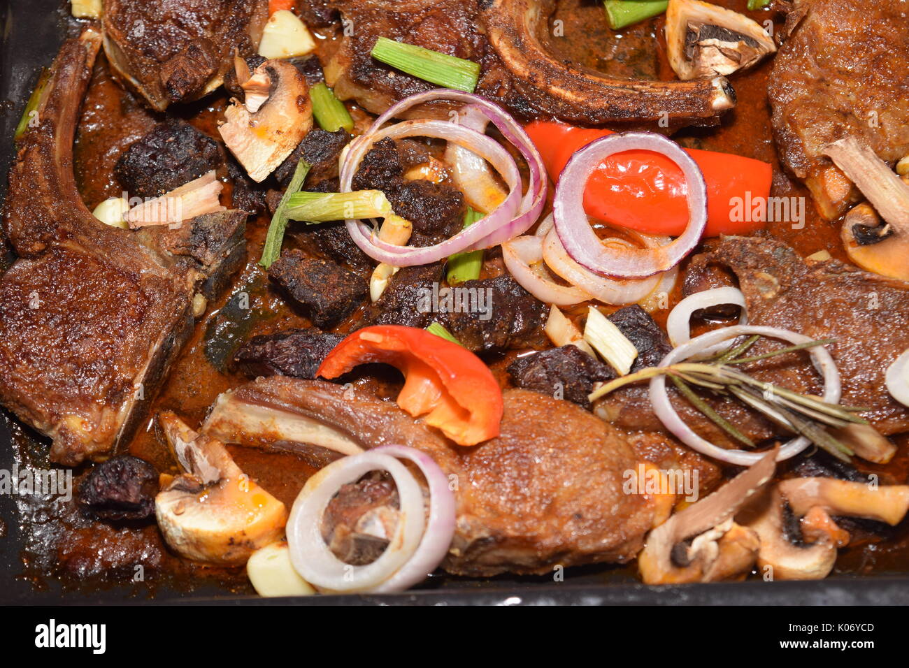 Lamb chops in a baking tray Stock Photo - Alamy