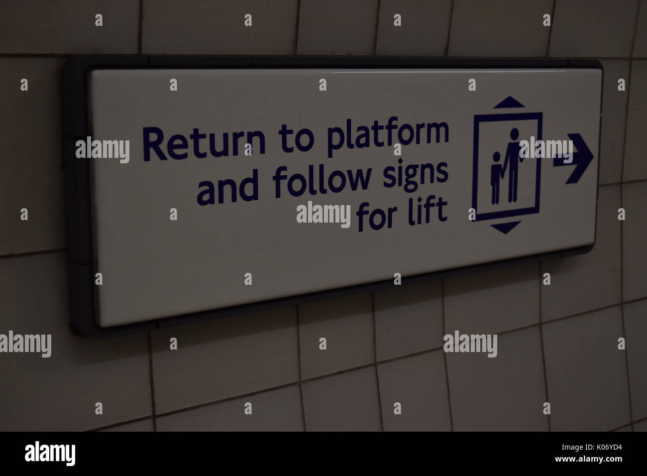 Platform signs at a train station Stock Photo - Alamy