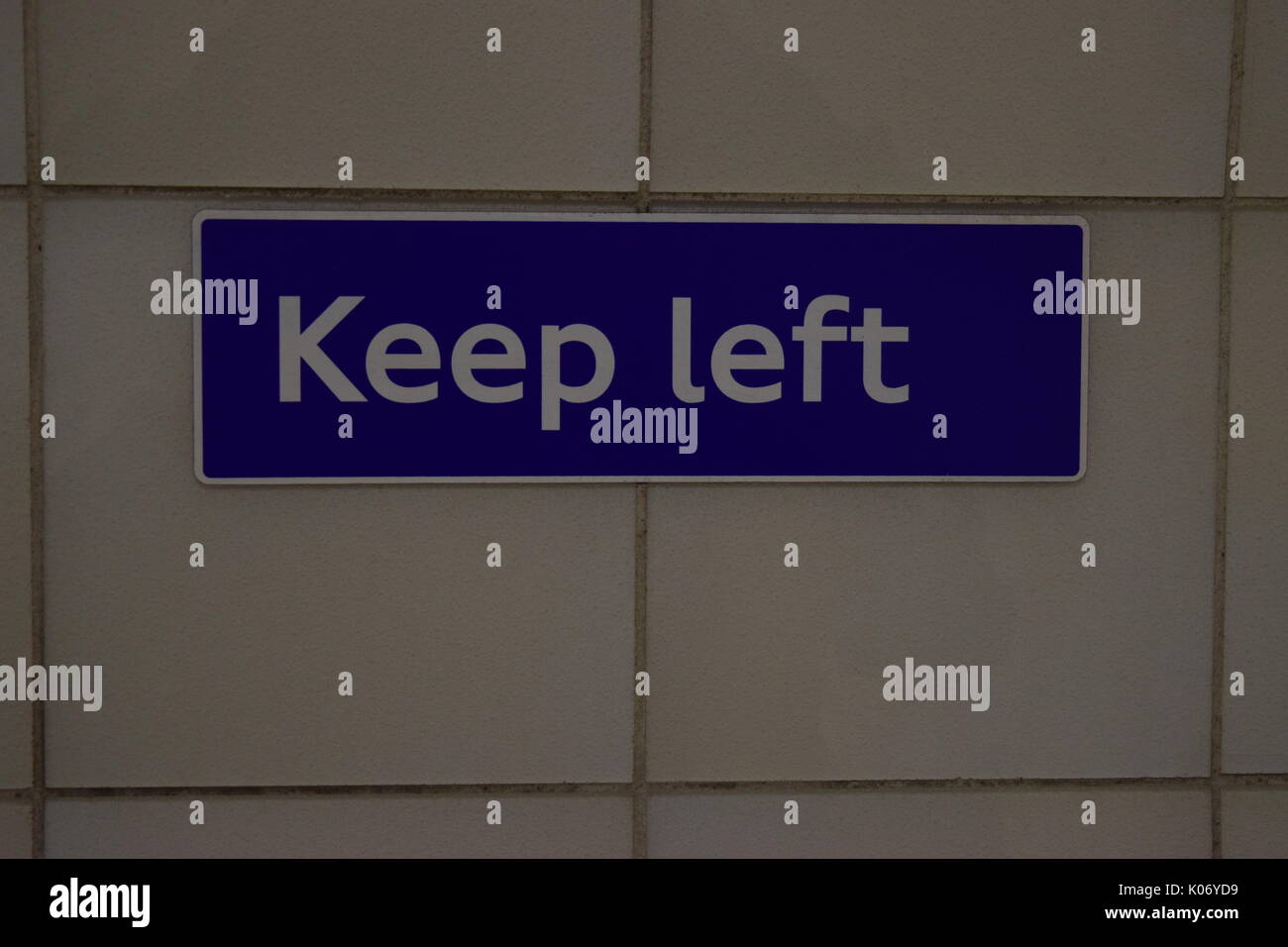 Keep left sign in a tube station Stock Photo - Alamy