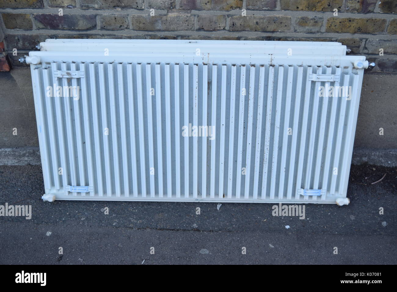 Old abandoned home radiator Stock Photo - Alamy