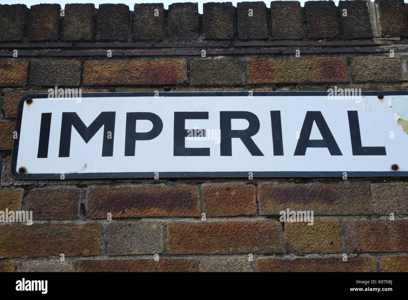 Sign signage brick bricks wall brickwork hi-res stock photography and ...