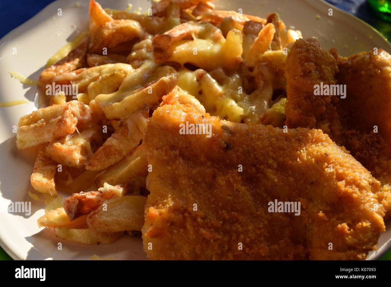 Cheese covered fries hi-res stock photography and images - Alamy