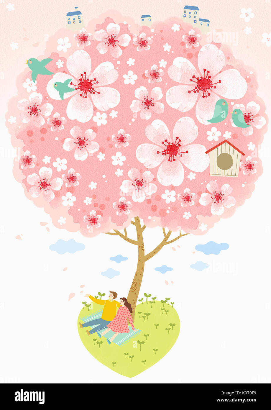 Couple resting under a flower tree in spring Stock Photo - Alamy