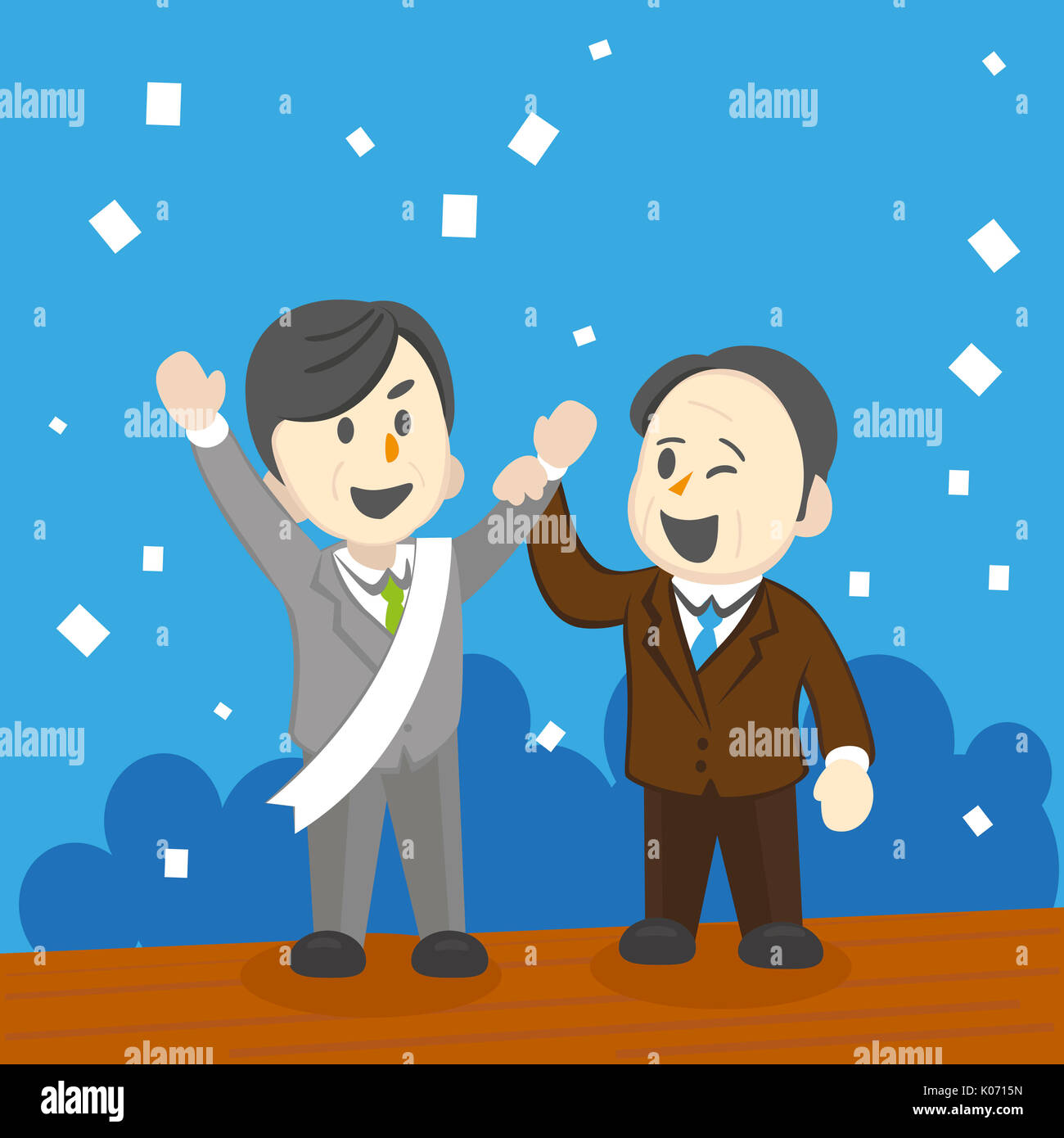 Two smiling politicians holding and raising their hands Stock Photo - Alamy