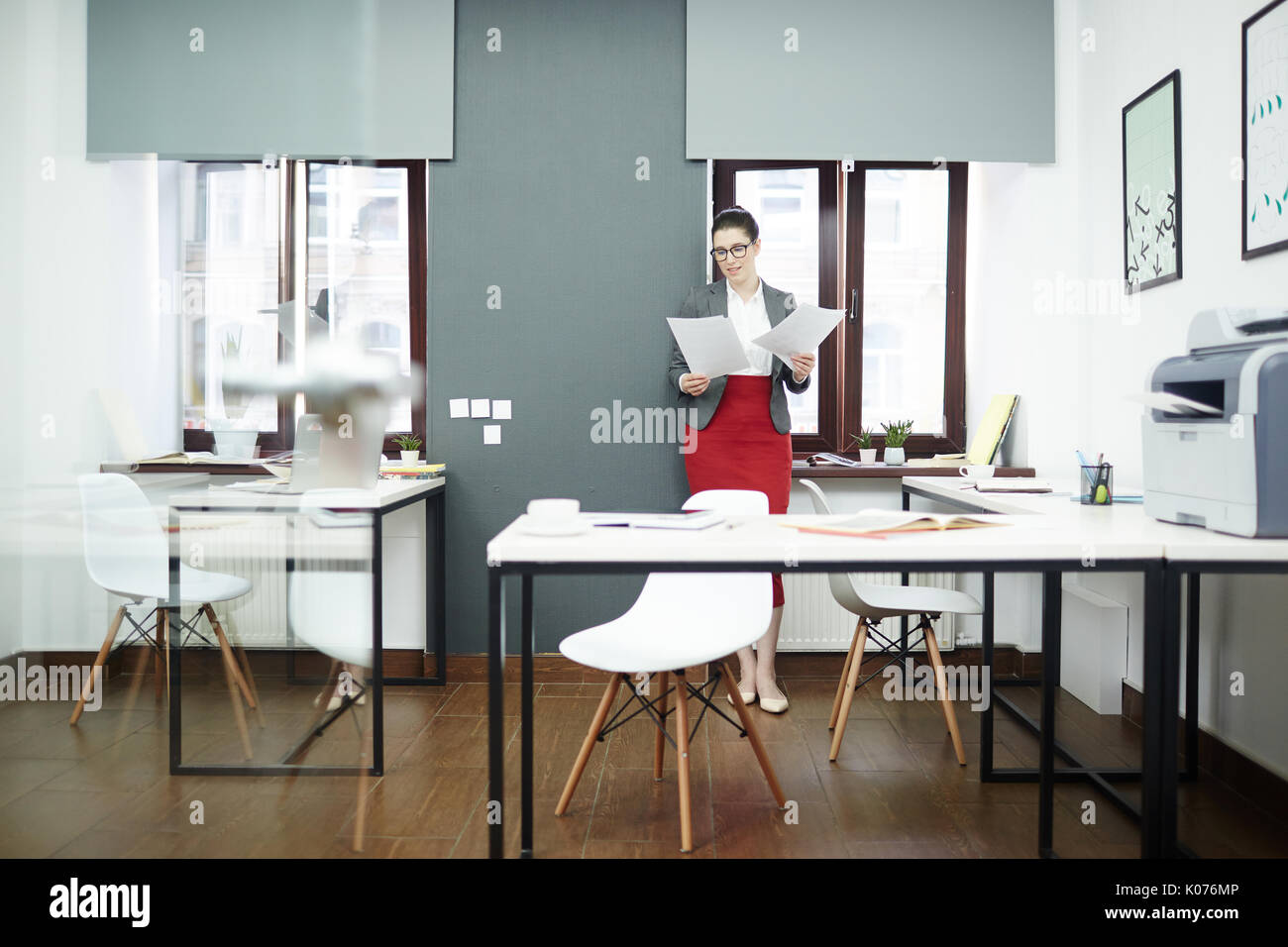 Pretty Businesswoman Doing Paperwork Stock Photo - Alamy
