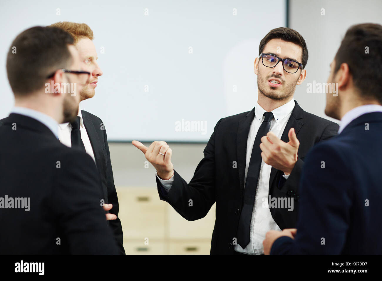 Sharing Ideas with Colleagues Stock Photo - Alamy